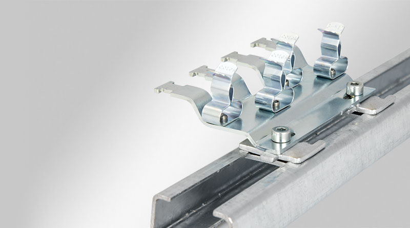 EMC clamp assembly for 30 mm DIN rail shape C with integrated strain relief