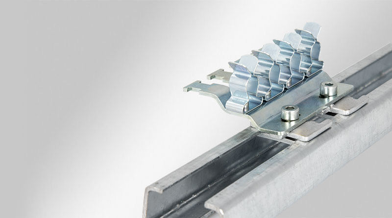 EMC clamp assembly for 30 mm DIN rail shape C with integrated strain relief